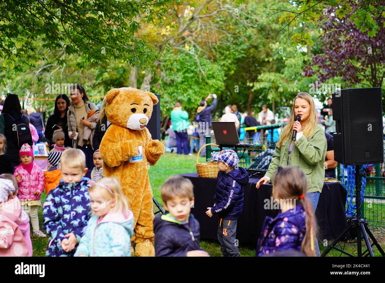 A bear-dressed person having fun with Kindergarten kids Stock Photo - Alamy