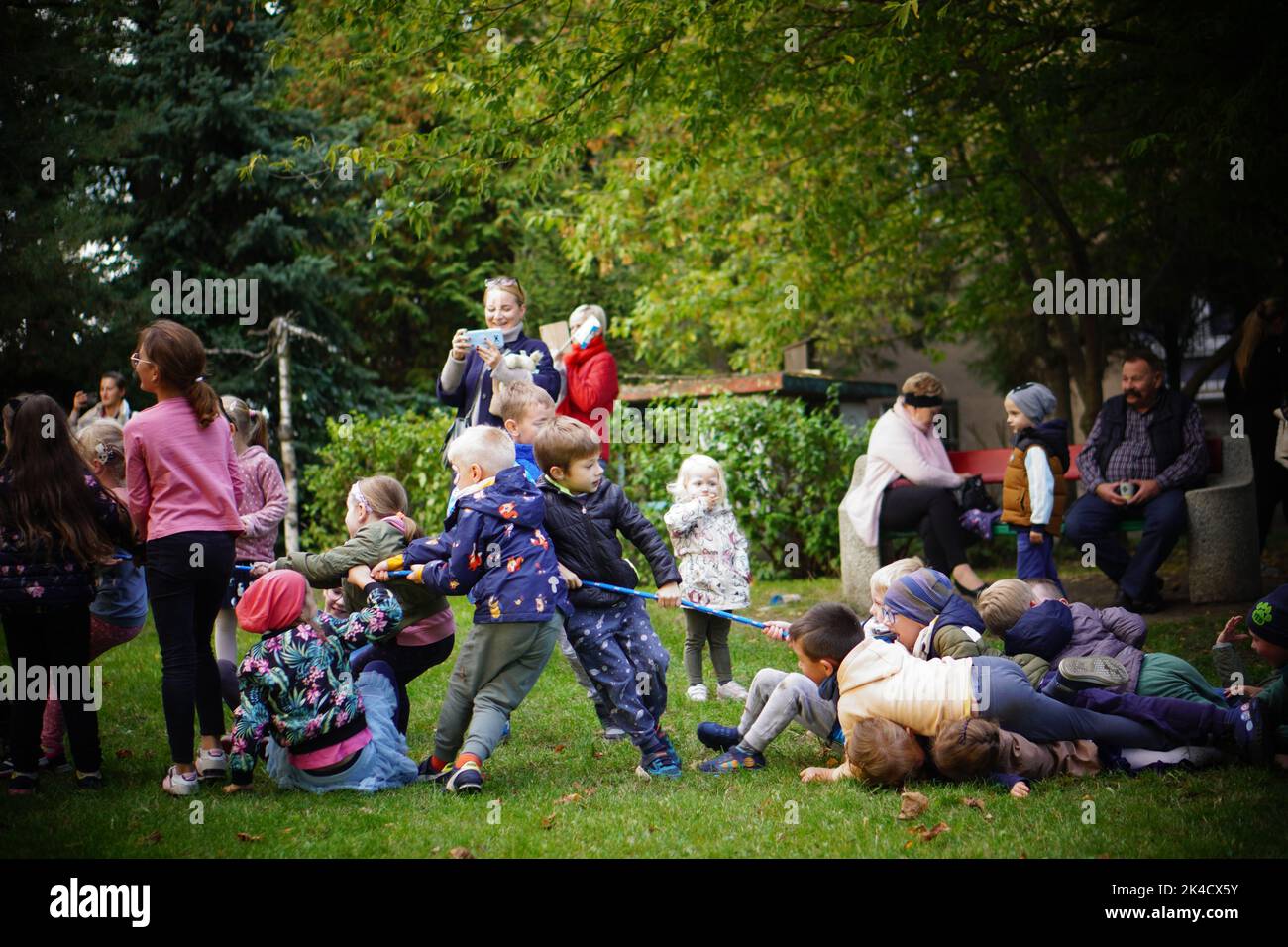A group of children having fun during a game at a Kindergarten event ...