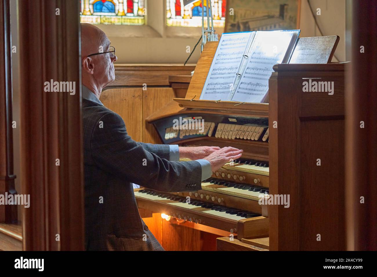 An organ player at St John the Baptists Church in Margate Stock Photo ...