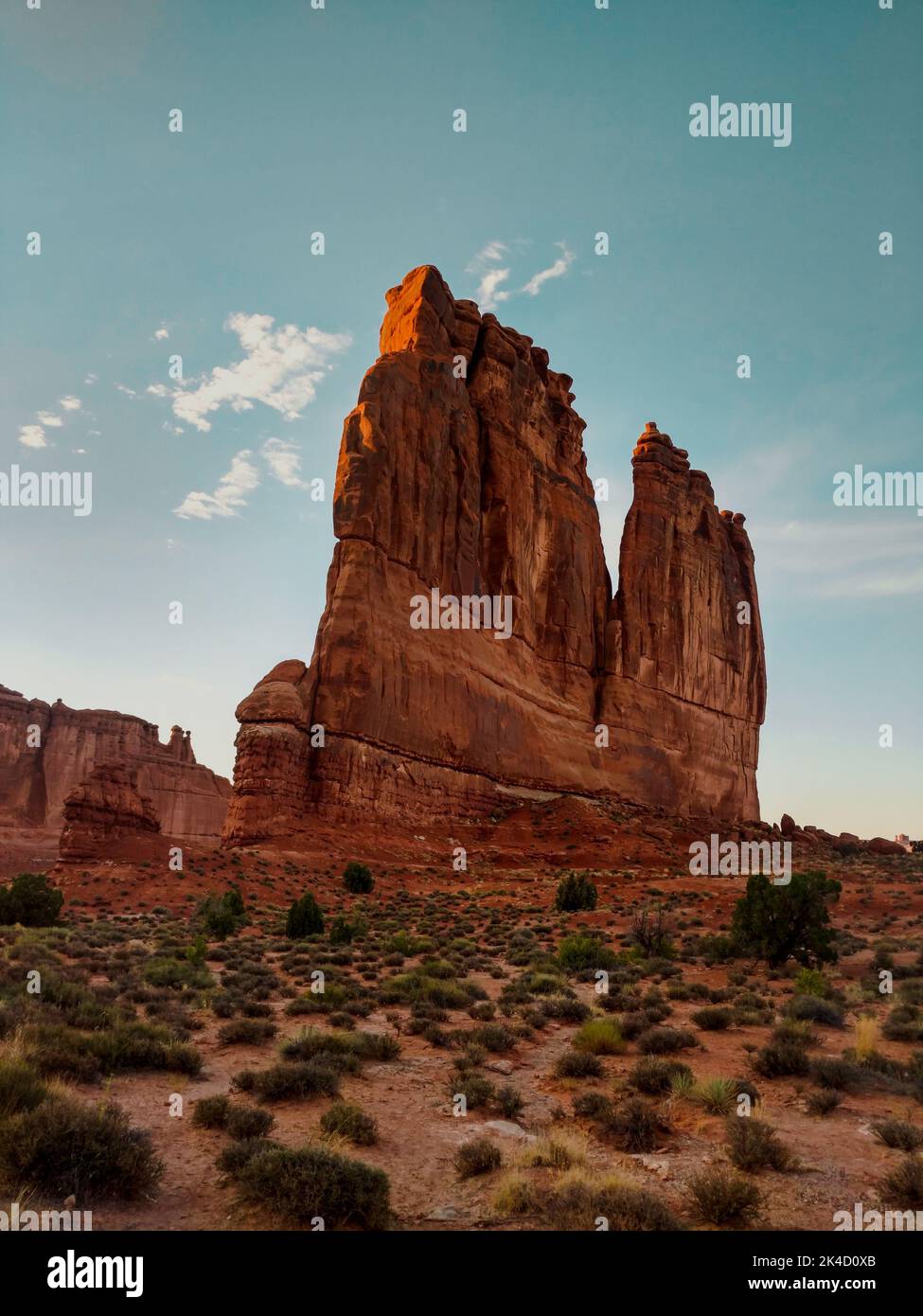 A beautiful view of Courthouse Towers in Arizona on desert with plants ...