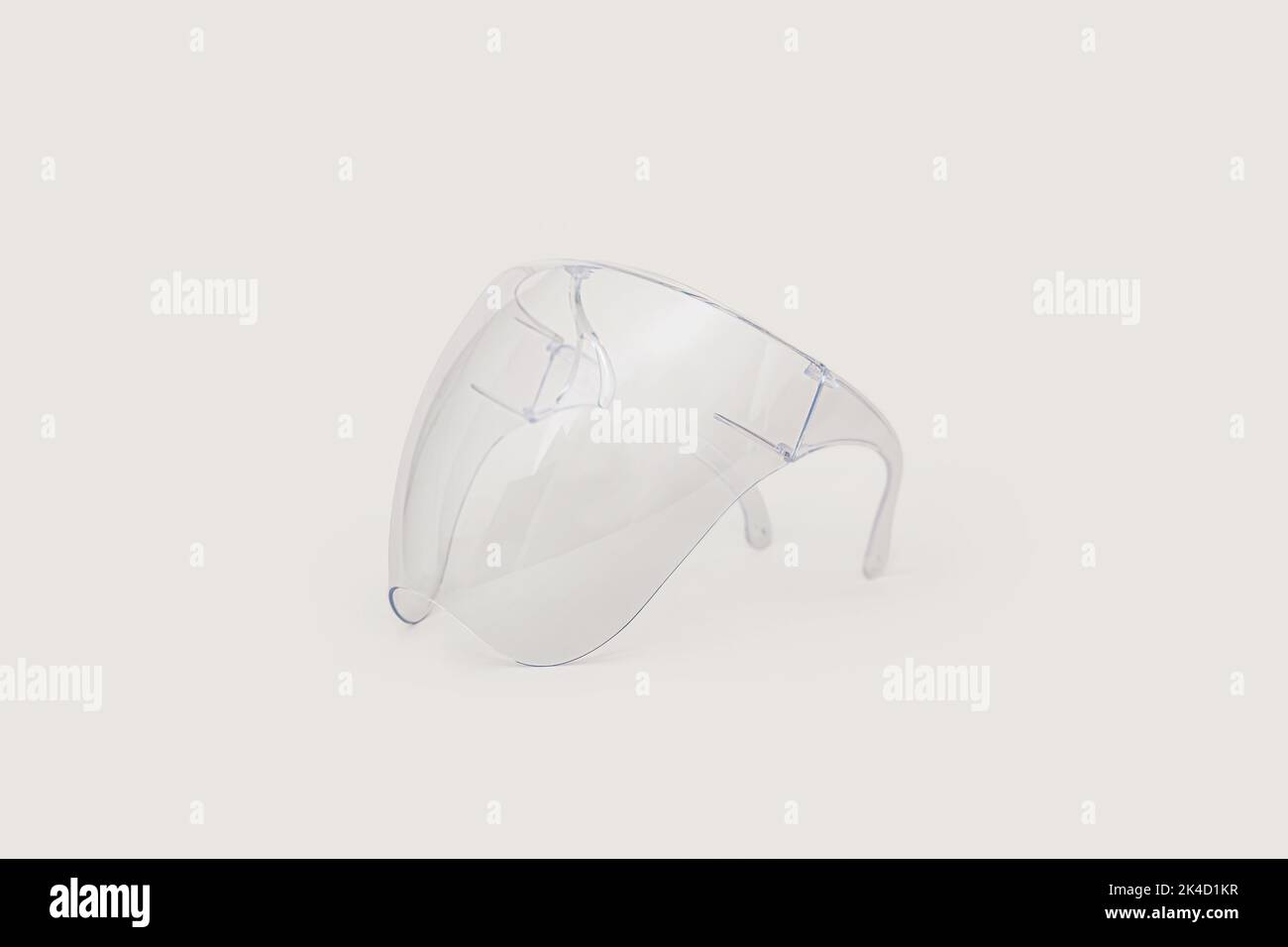 Transparent face shield isolated on white background, perspective view ...