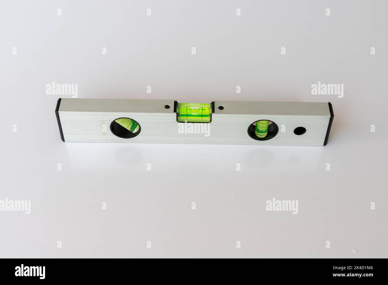 Construction tool for leveling floor and walls on white isolated ...