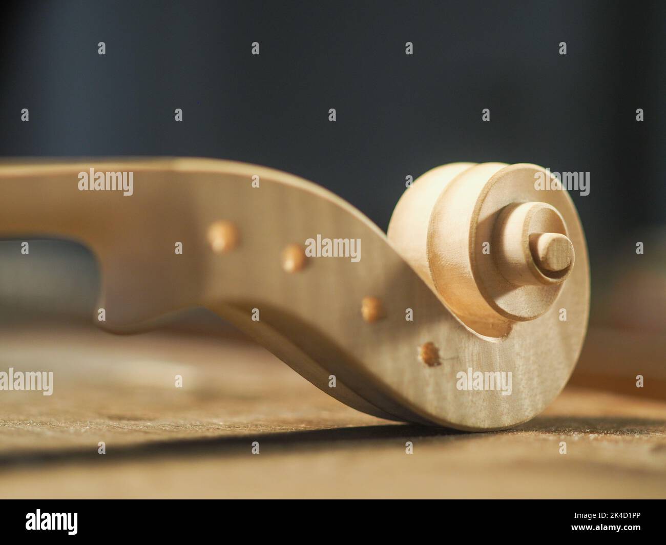 Wooden detail of the head of the violin. Raw wood, texture Stock Photo ...