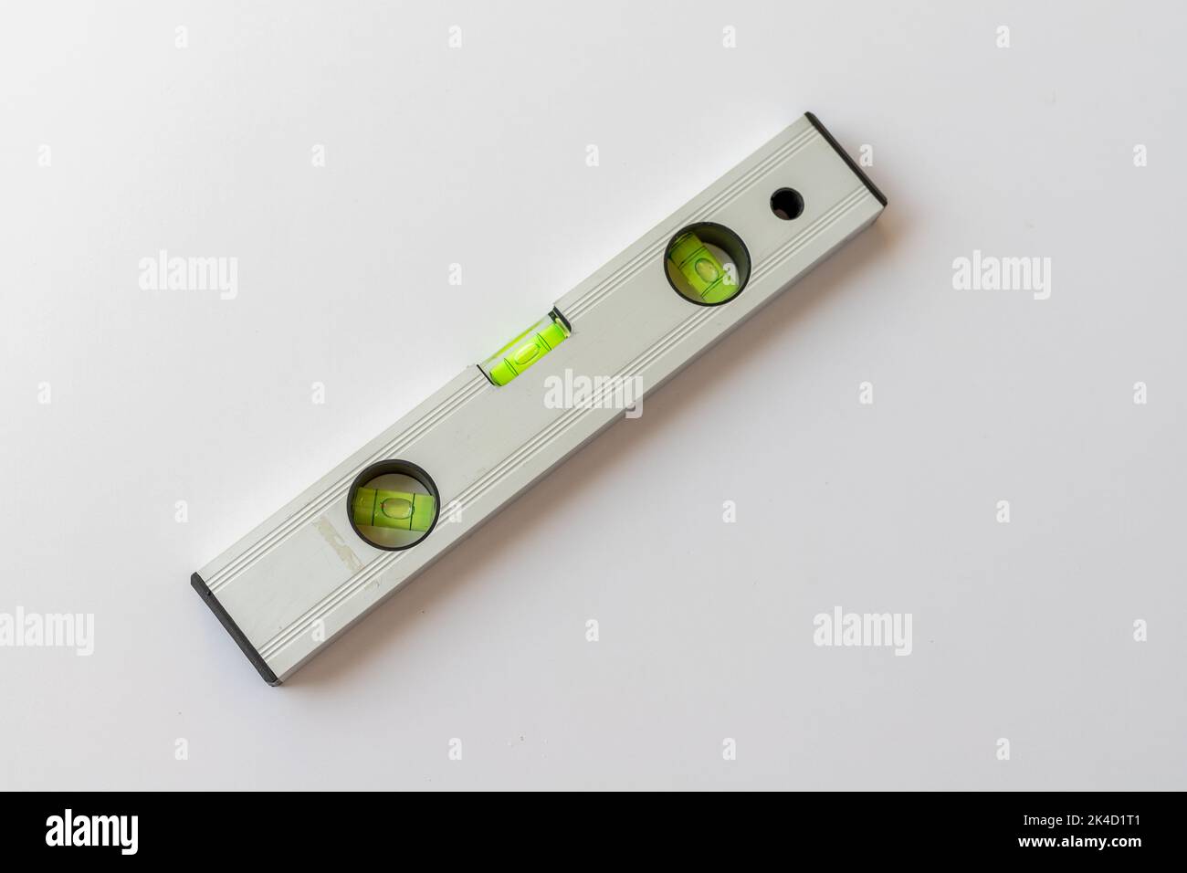 Spirit level tool top view on white isolated background Stock Photo - Alamy