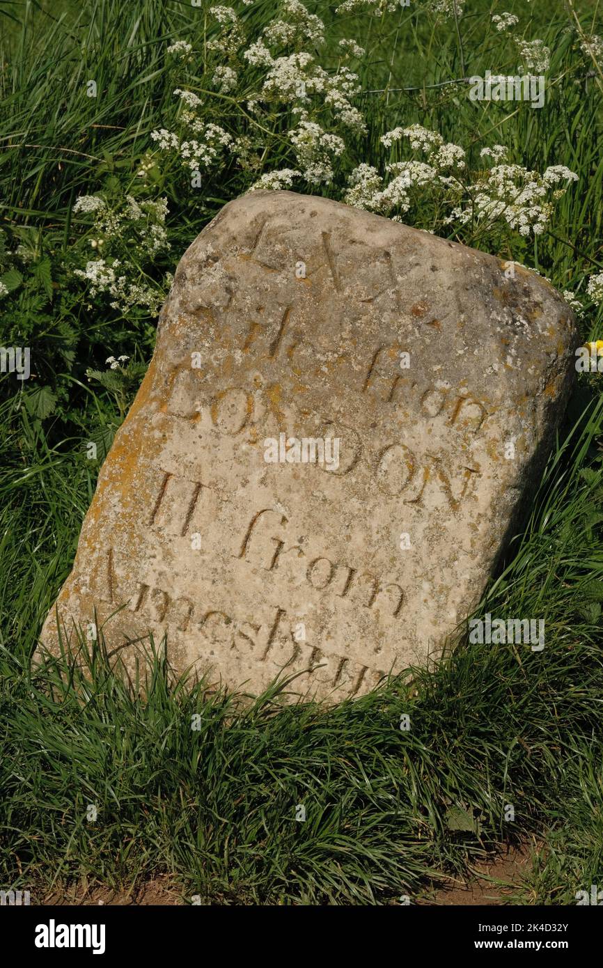 A vertical shot of an old tombstone from ancient Roman London ...