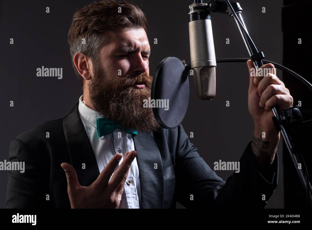 Music festival. Karaoke singer. Man singing with music microphone Stock ...