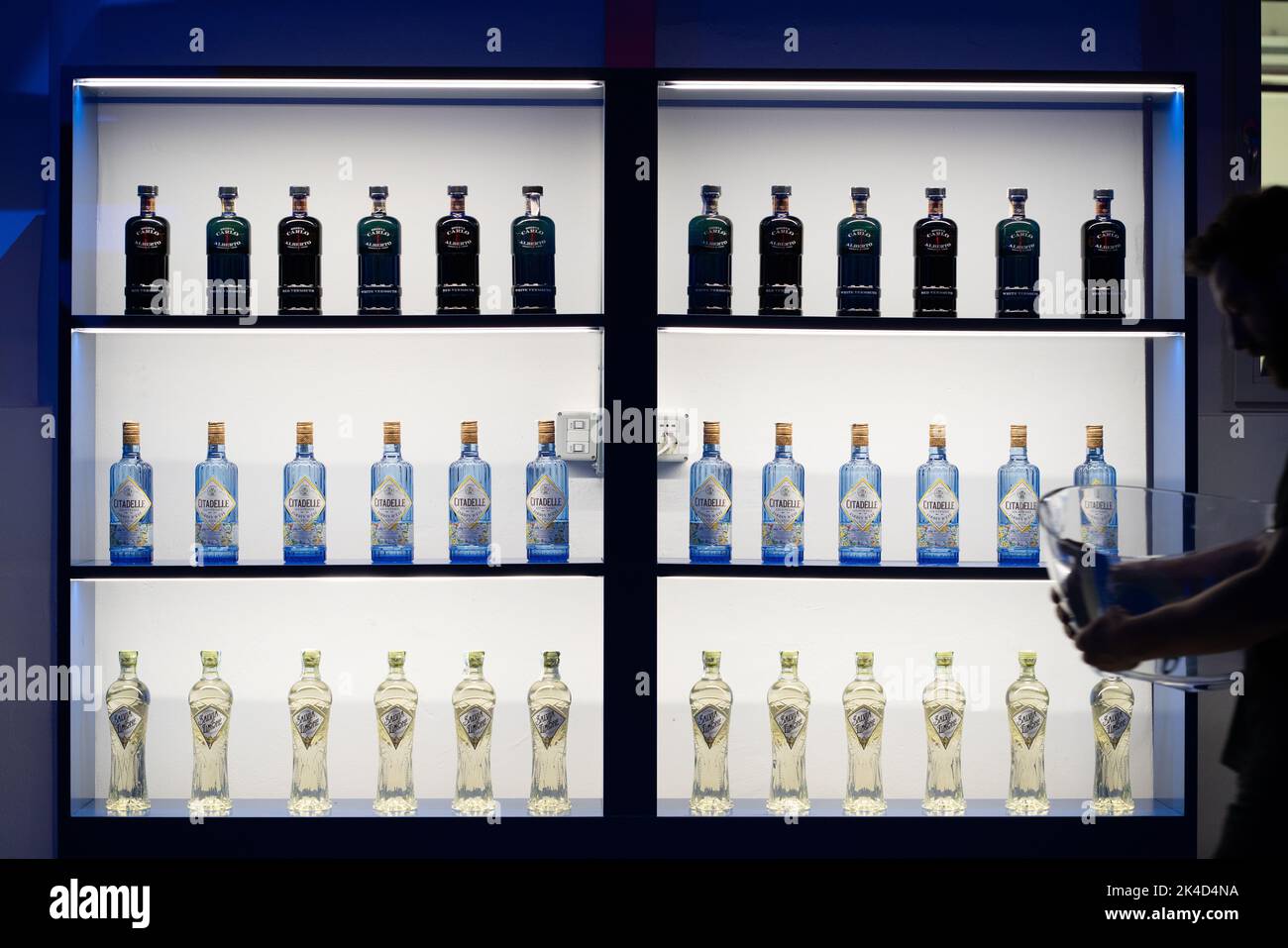 An illuminated display with expensive bottles of alcohol at Milan ...