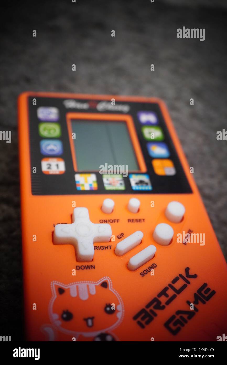 A Han Cheng brick game hand console in monochrome colors Stock Photo ...