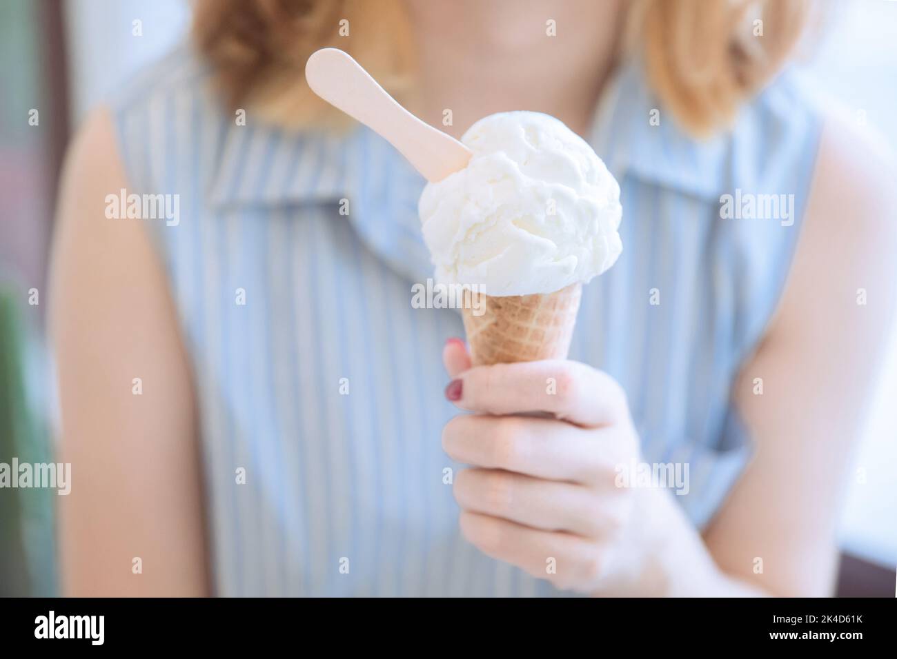 Young woman hand with ice cream at coffee shop modern life style Stock ...