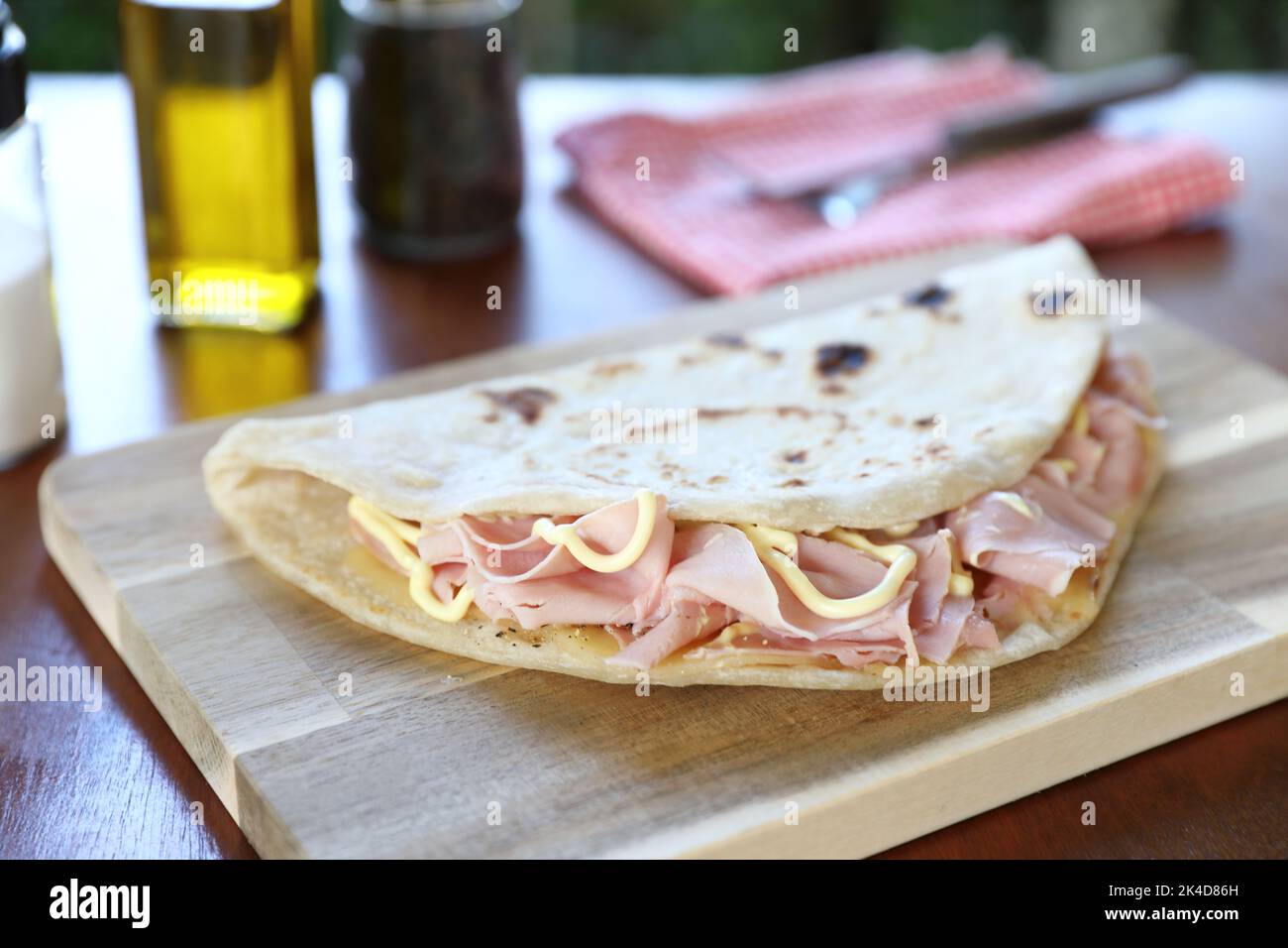 Italian cuisine , Piadina with Italian ham and cheese Stock Photo - Alamy