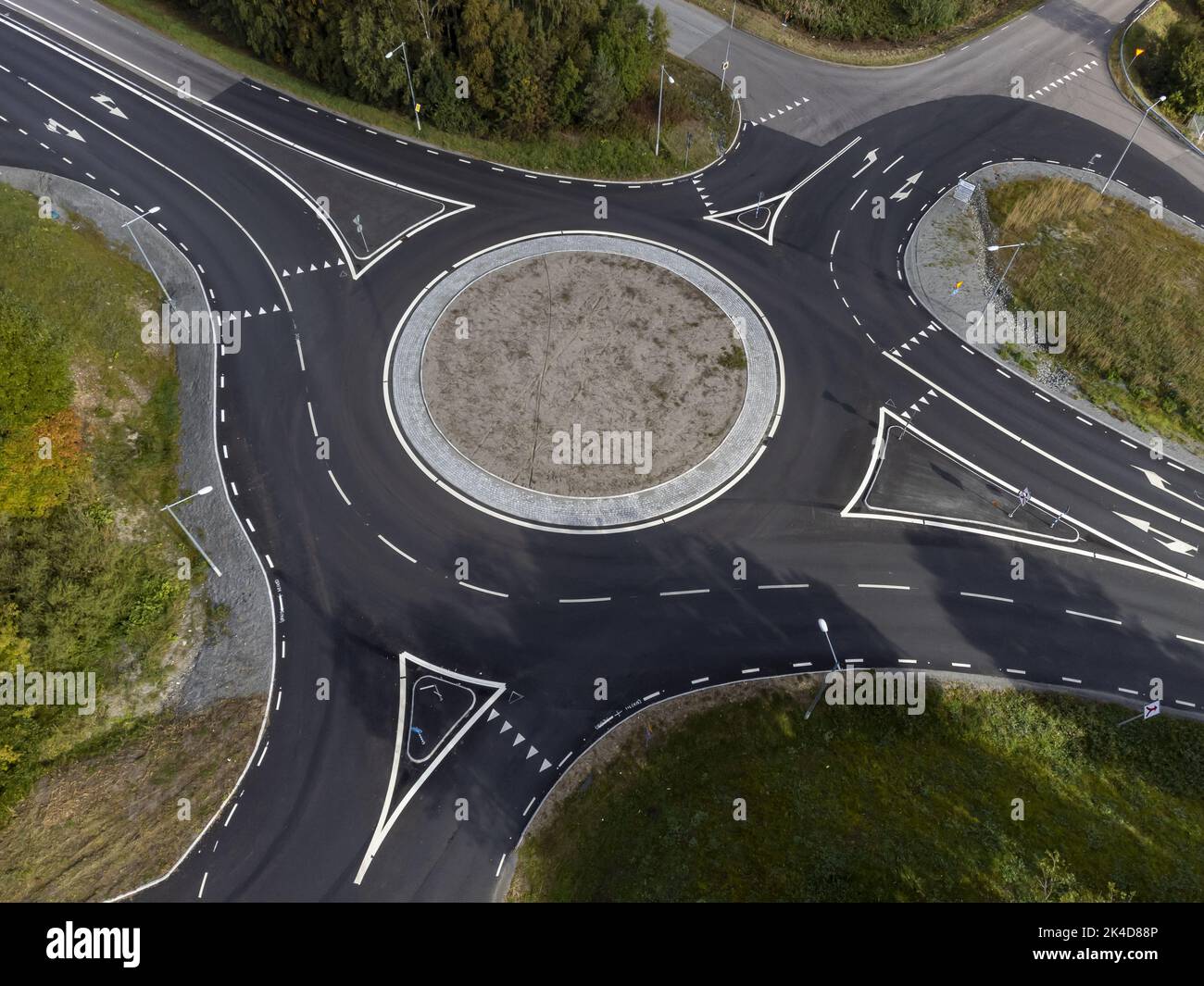 Bird's eye view of a traffic roundabout, roads, lanes with no cars ...