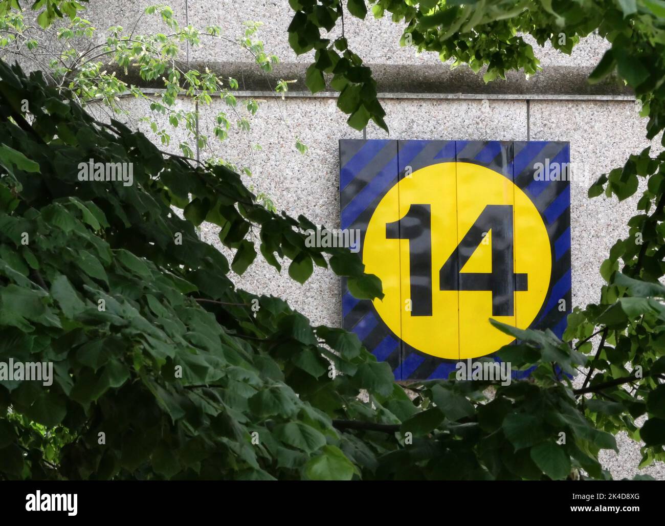 wall of an exhibition hall with sign number 14 Stock Photo - Alamy