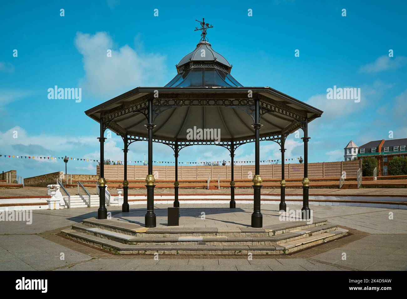 The oval Cliftonville Bandstand in the seaside town of Margate, England ...