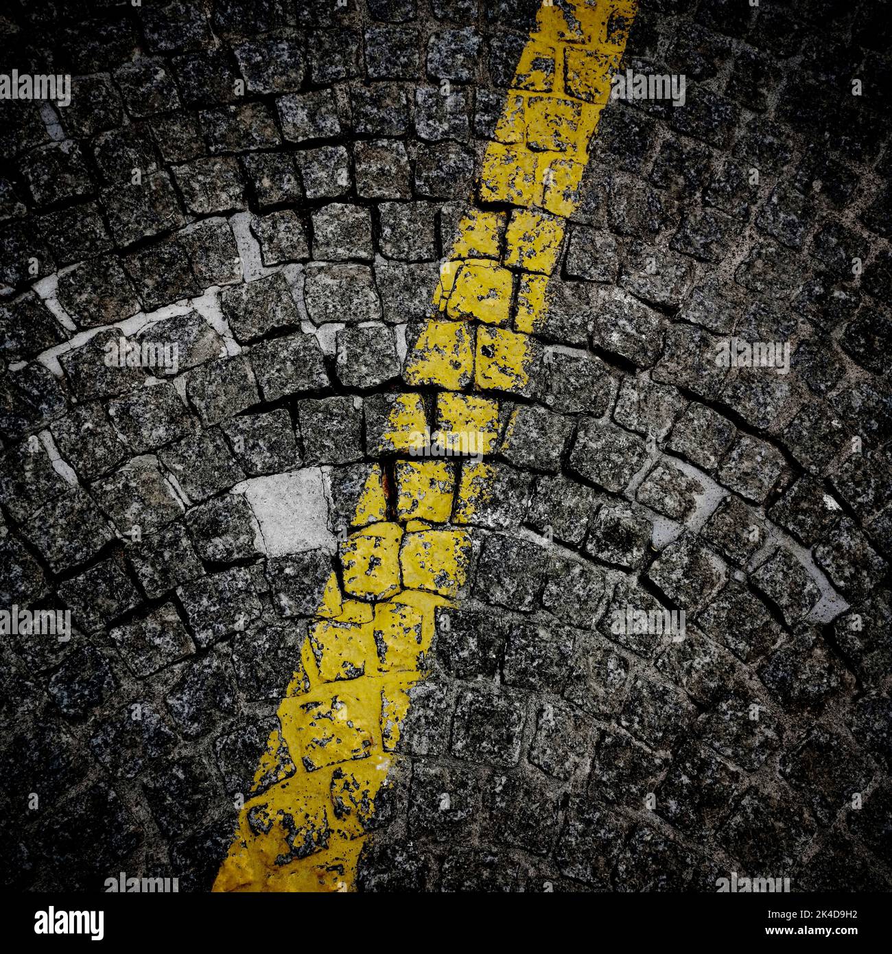 A gray asphalt road texture with a yellow traffic line outdoors Stock ...
