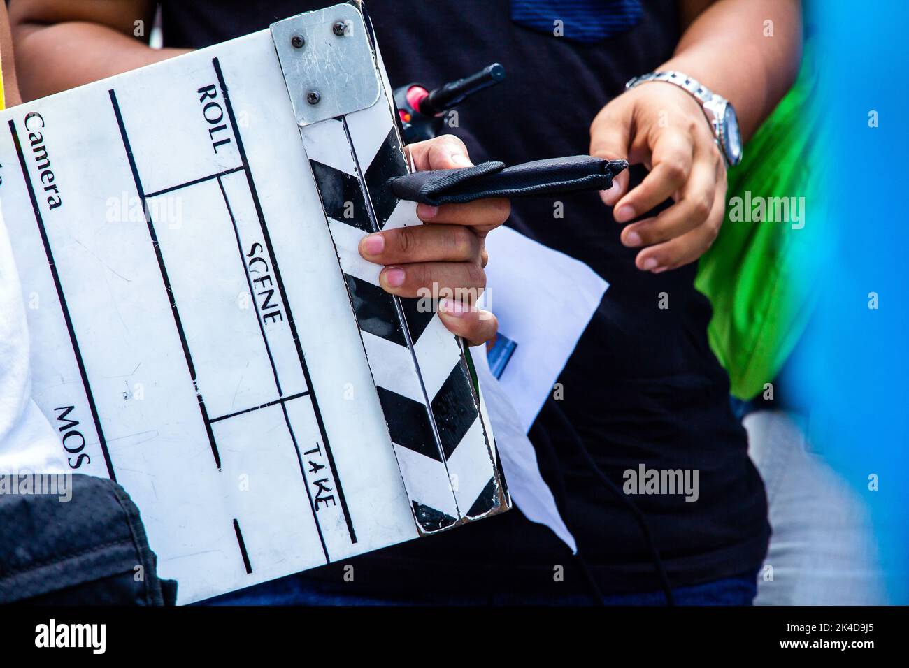 close up image of film production crew holding Film Slate on set Stock ...