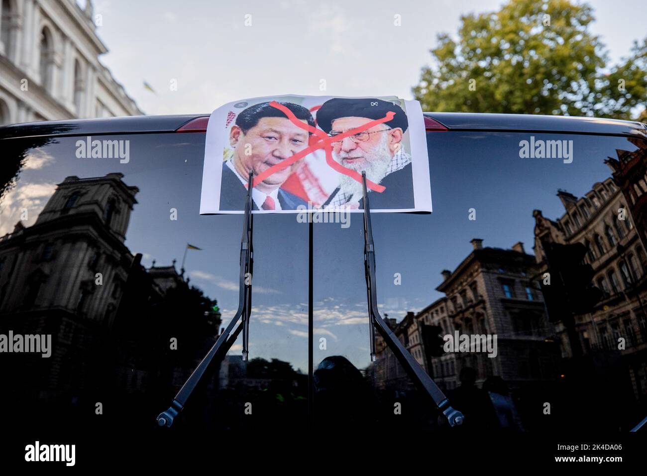 London, UK. 01st Oct, 2022. A portrait of the Xi Jinping and Ebrahim ...