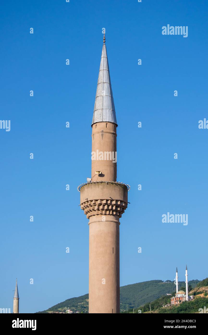 The minaret tower of a Muslim mosque in the city of Prizren, Kosovo ...