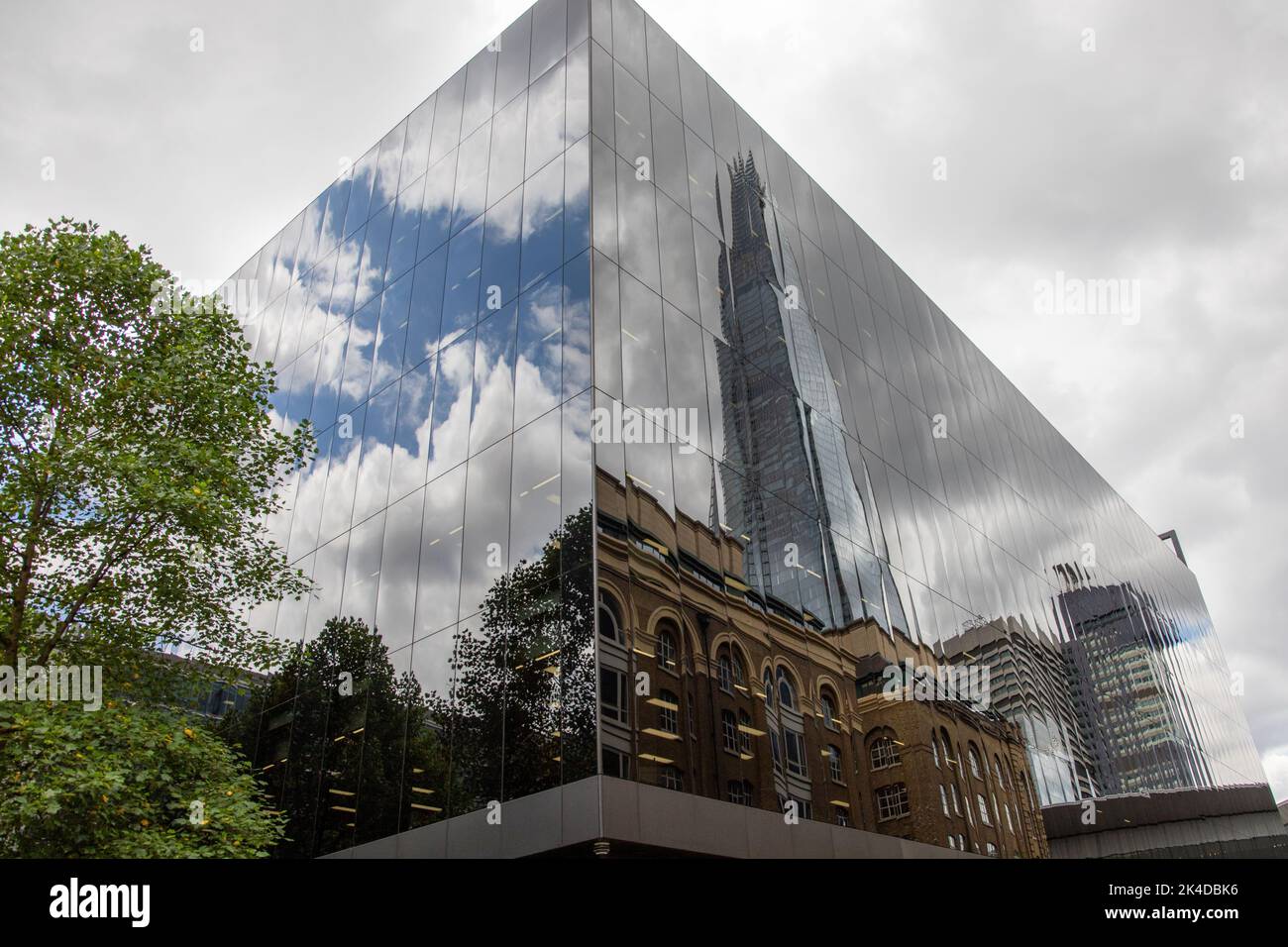 The Reflection of the Shard in a building near the Tower Bridge. London ...
