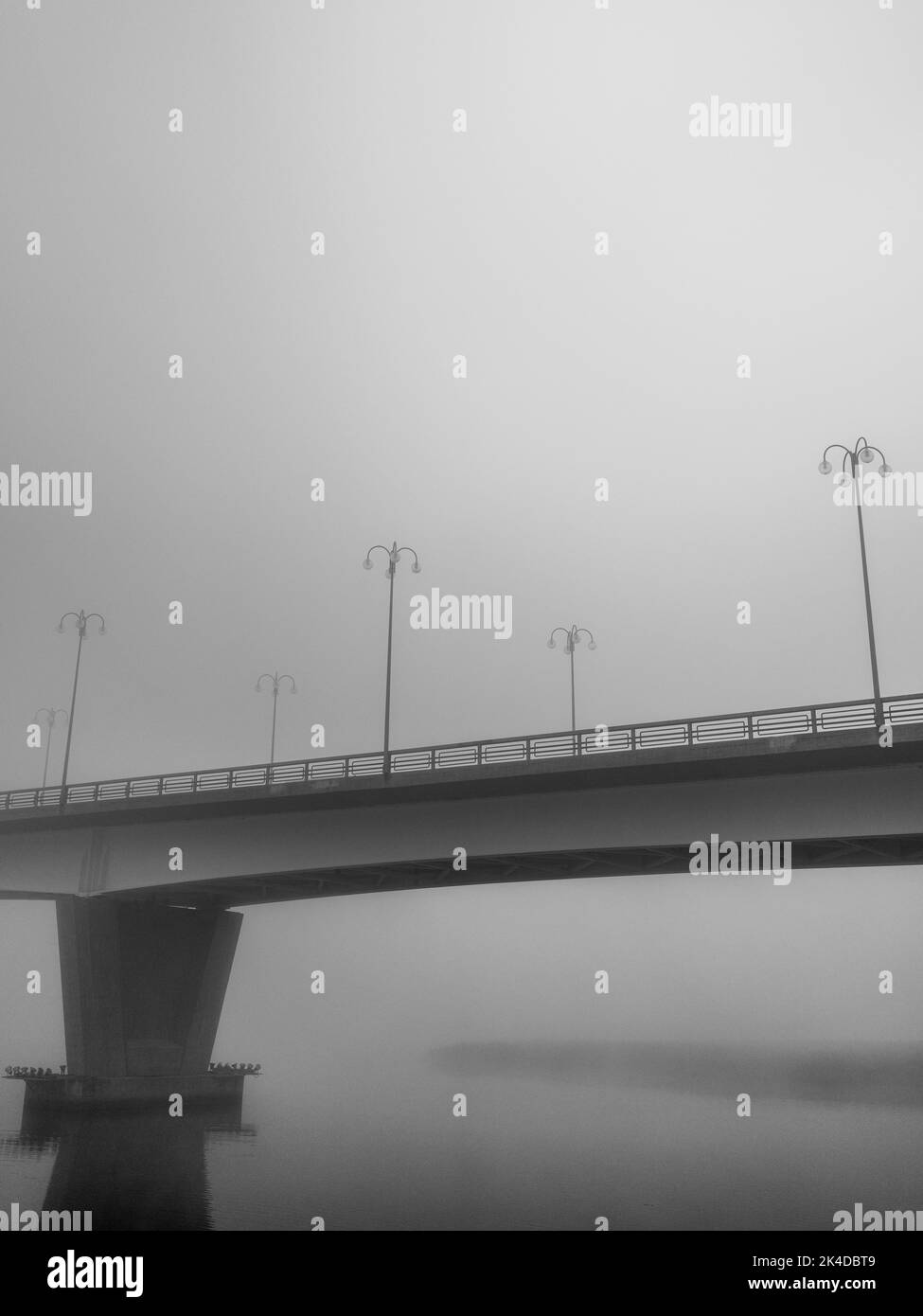 A greyscale morning mist street photography in the small city of ...