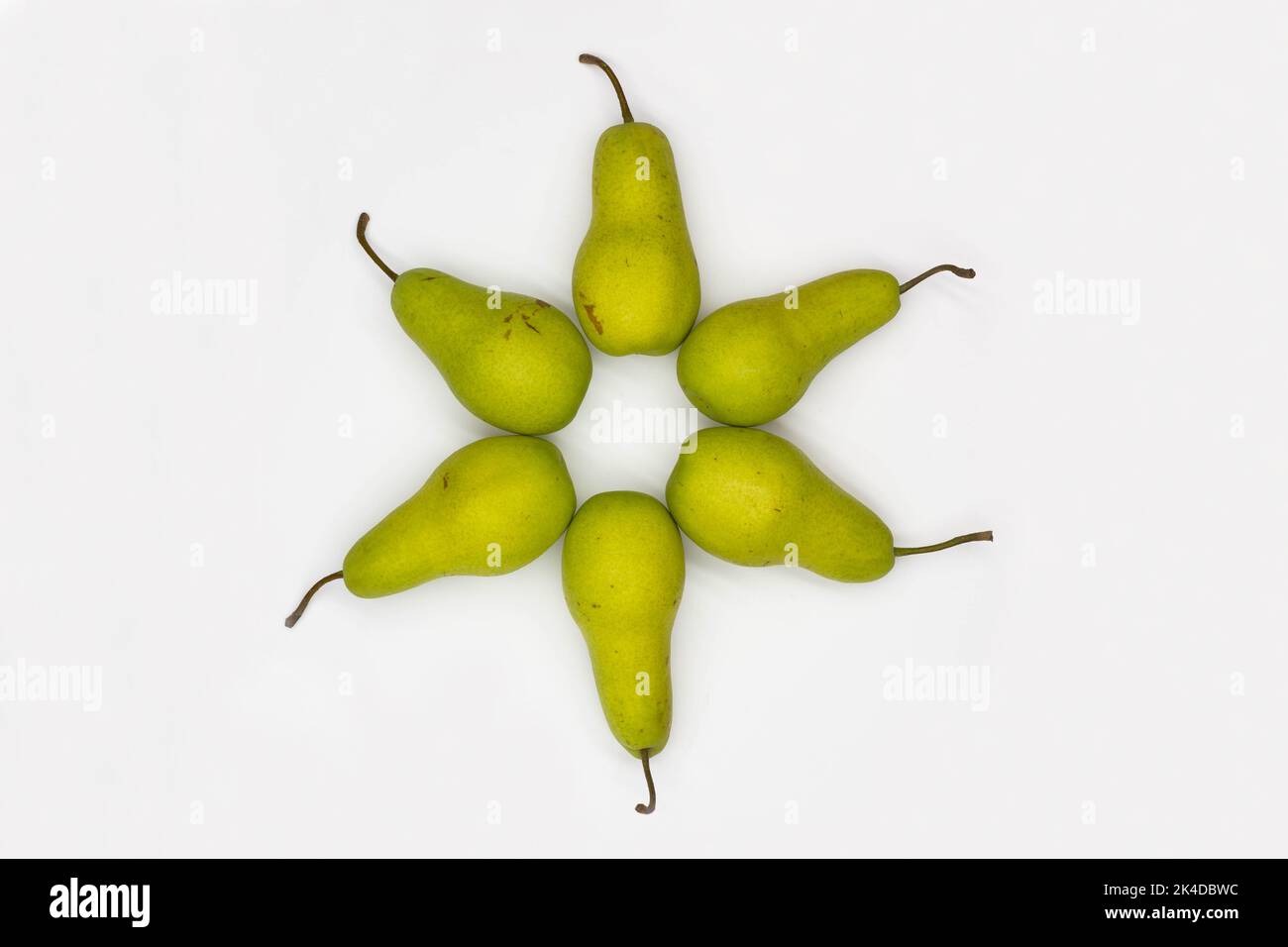 Star of David made from pears on white background. Ripe pears laid out ...