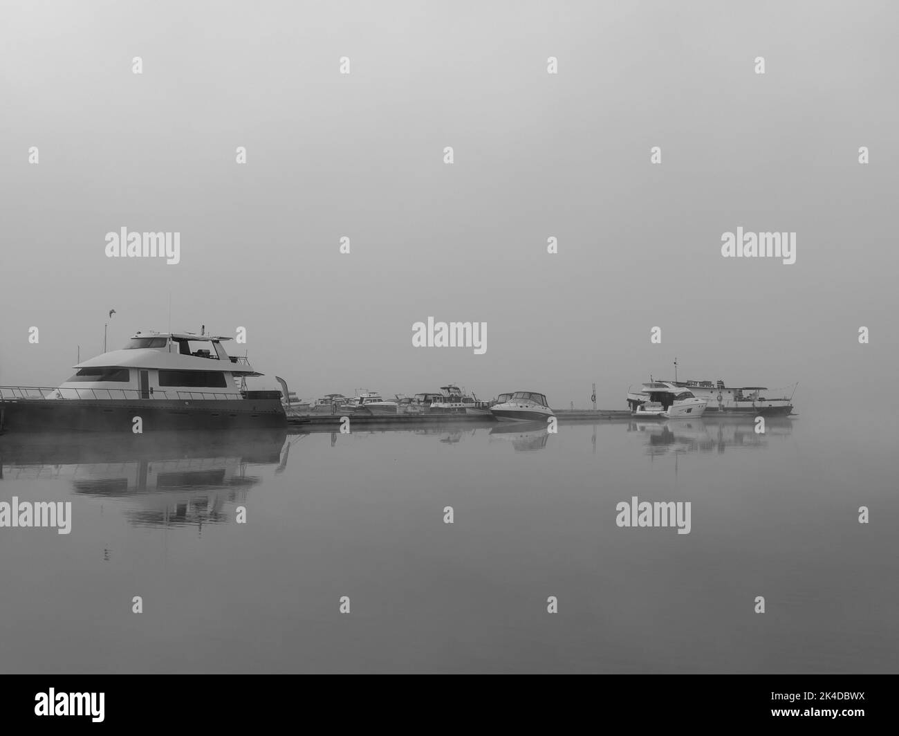 A greyscale morning mist street photography in the small city of ...