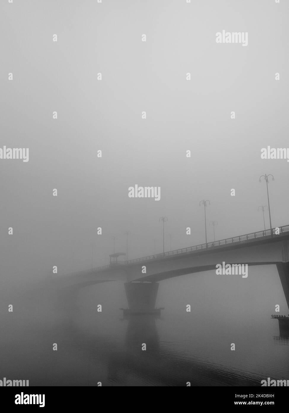 A greyscale morning mist street photography in the small city of ...