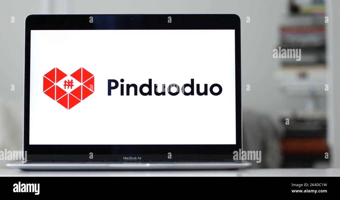 The logo of Pinduoduo, a Chinese grocery and agriculture ecommerce ...