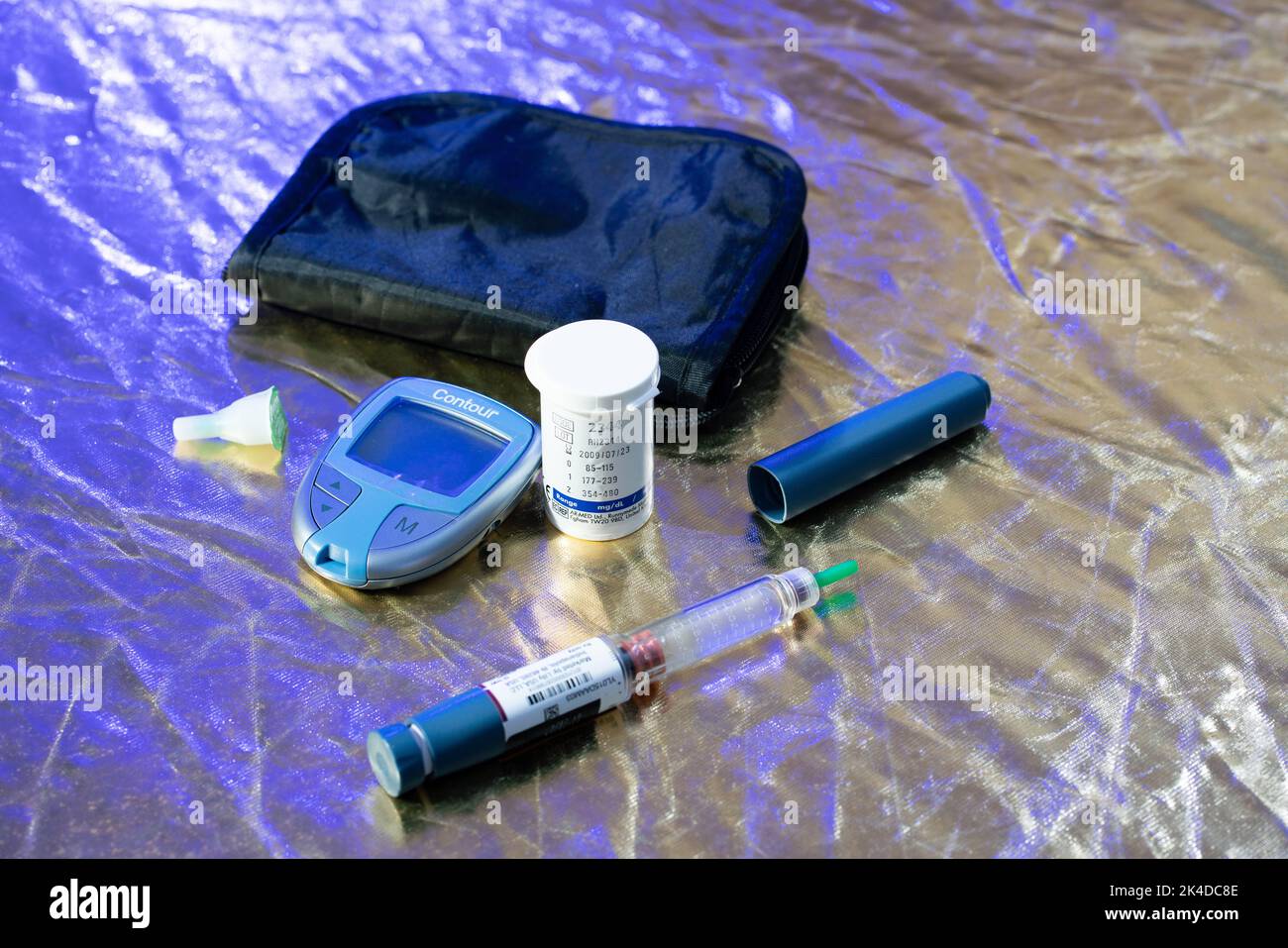 Insulin pen and blood glucose meter on white background Stock Photo - Alamy