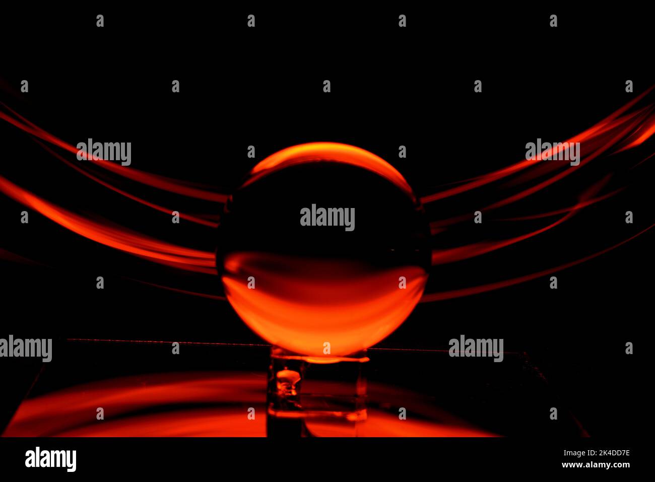 A crystal ball on a small crystal rectangular surface reflecting the ...