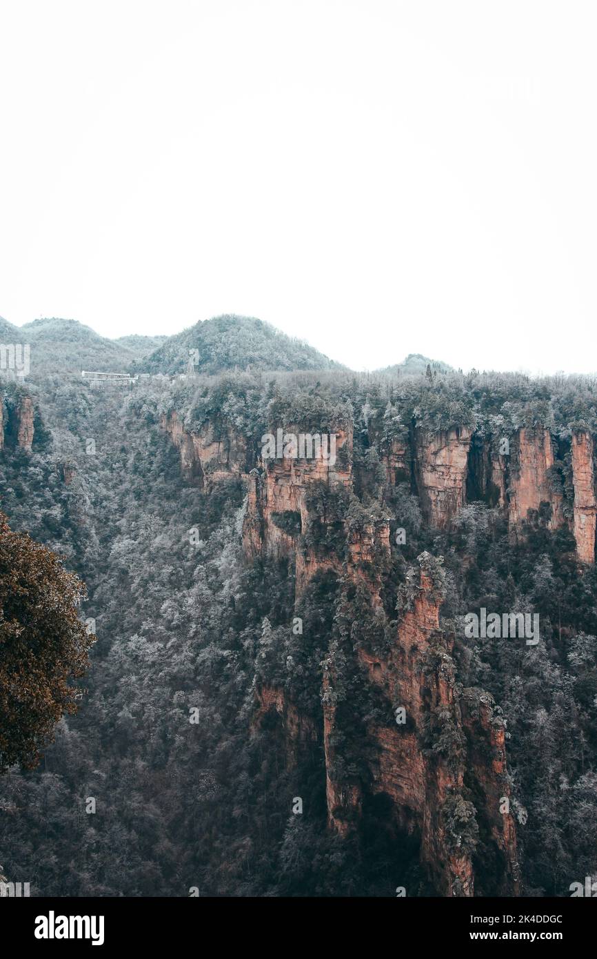 A vertical aerial shot of the Wulingyuan scenic area with sandstone ...