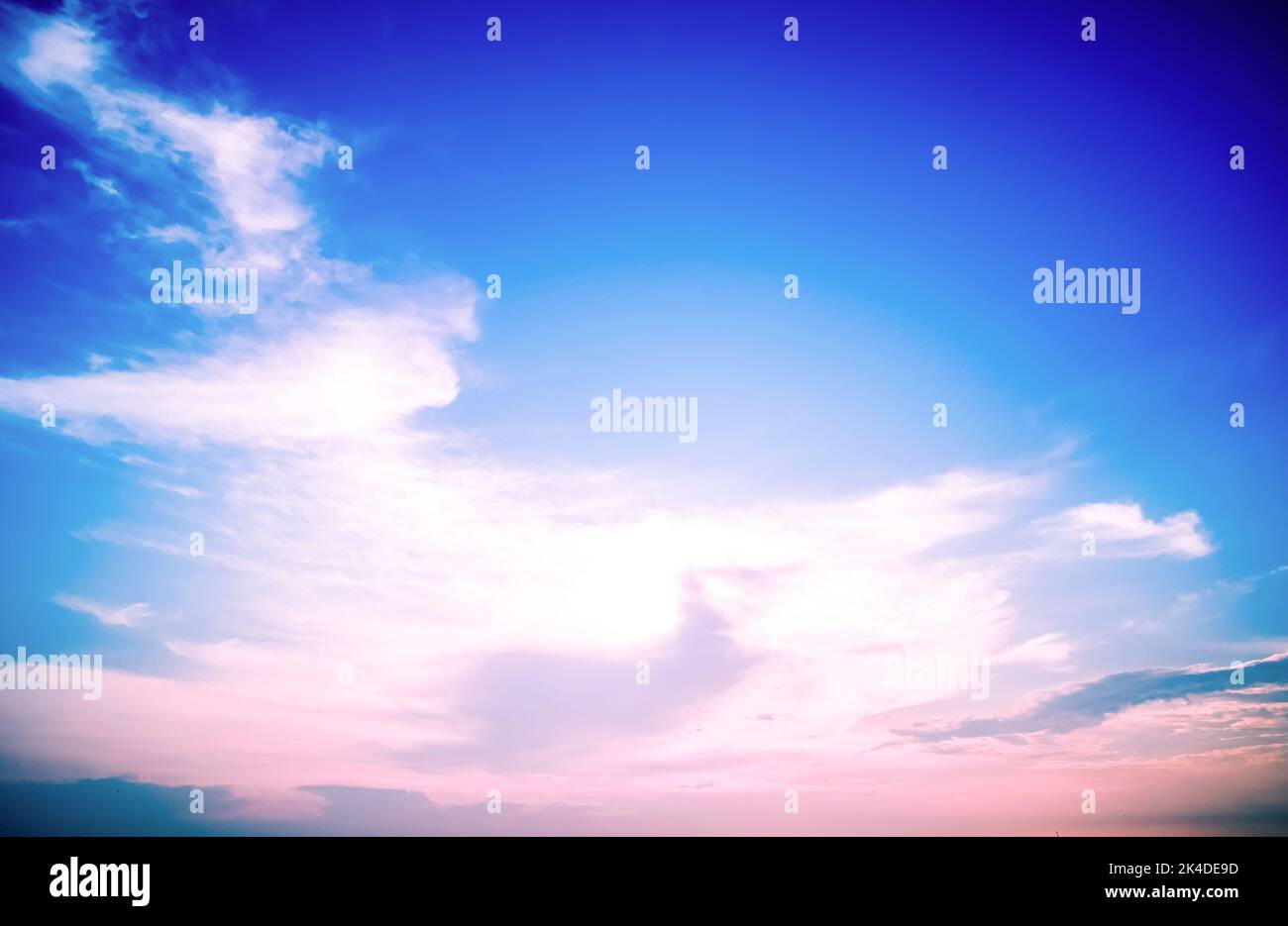 Blue sky with golden clouds. the last rays of the evening sun Stock ...