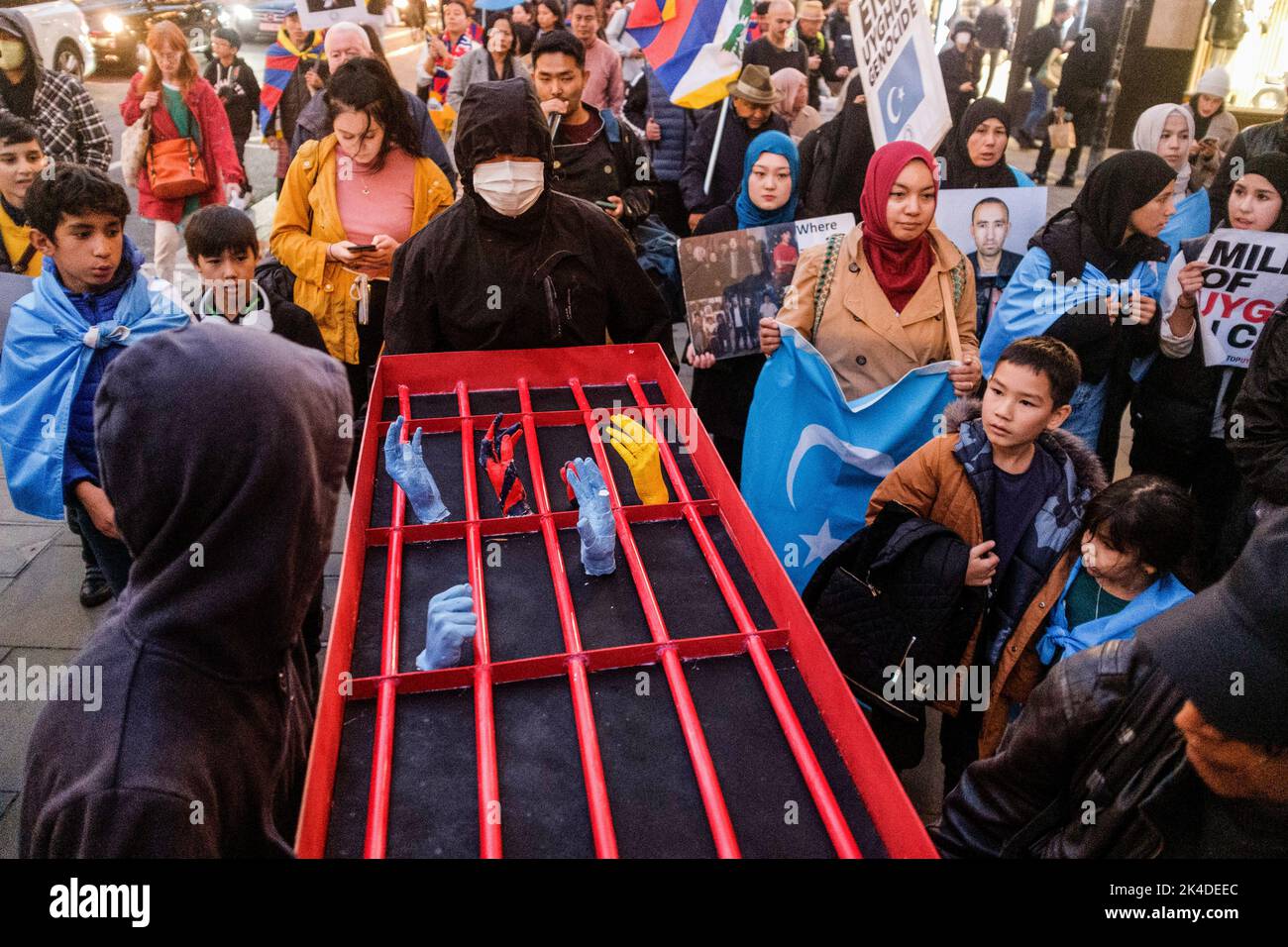 London, UK. 01st Oct, 2022. Protesters holds a replica mini prison cell ...