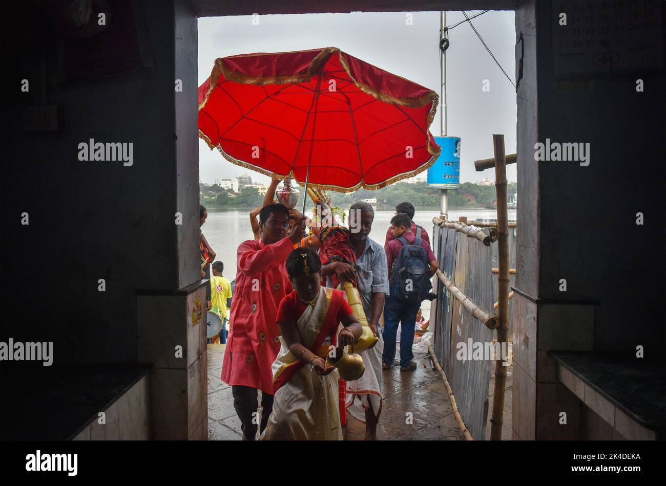 Kolkata, India. 02nd Oct, 2022. Hindu devotees perform rituals in front ...