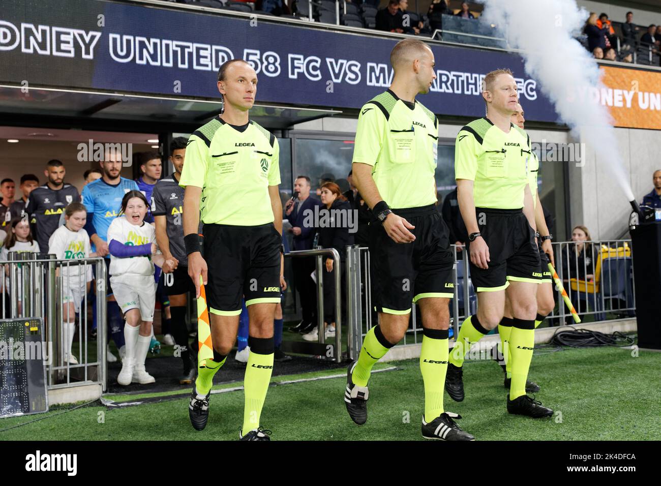 SYDNEY, AUSTRALIA - OCTOBER 1: Match referee Daniel Elder (second from ...
