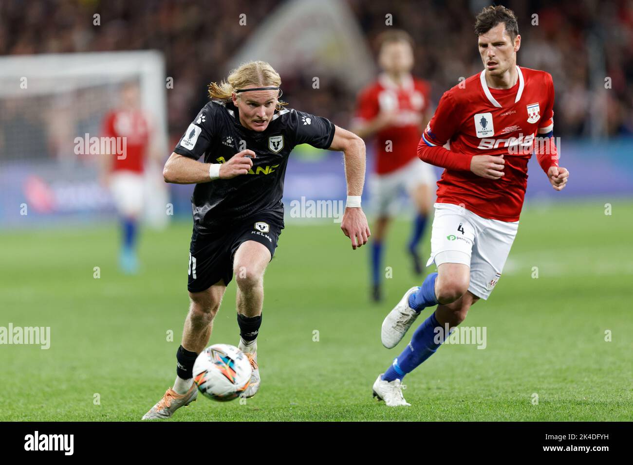 SYDNEY, AUSTRALIA - OCTOBER 1: Lachlan Rose of Macarthur FC runs with ...