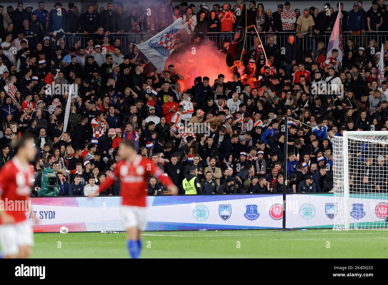 SYDNEY, AUSTRALIA - OCTOBER 1: Sydney United fans light a flare during ...