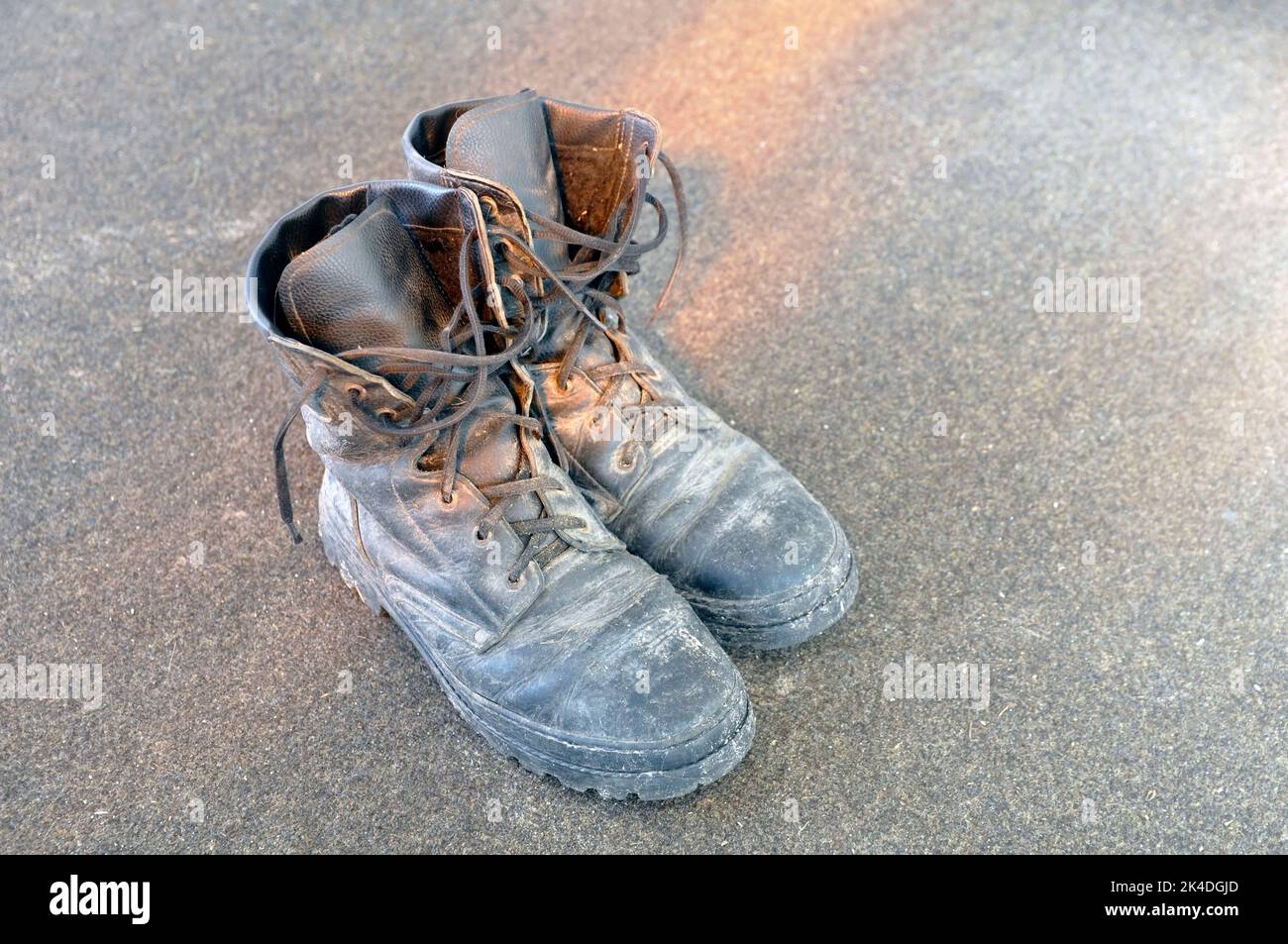 Old torn and dirty army boots. Shoes. Soldier's wardrobe Stock Photo ...