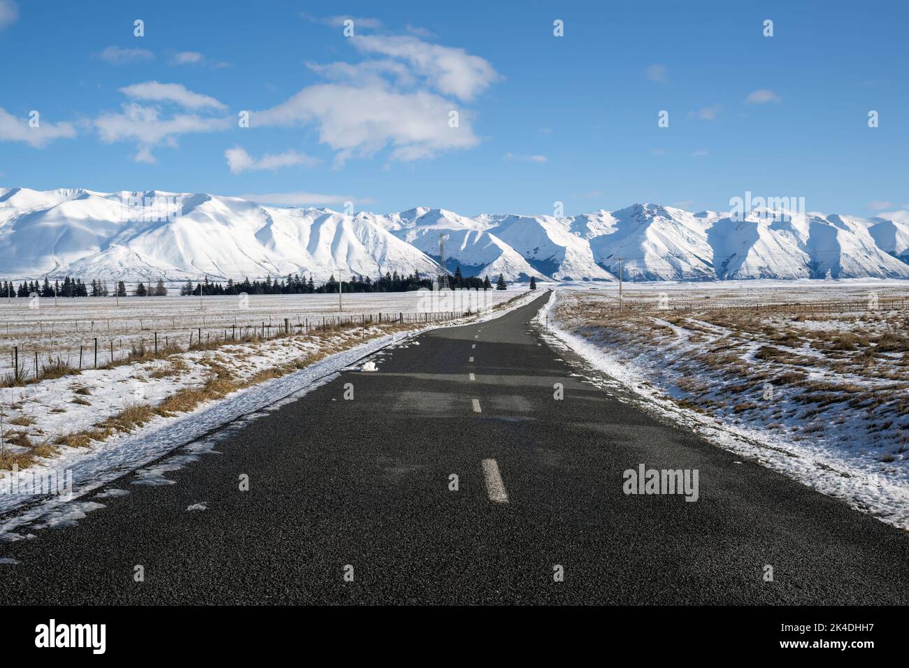 Lake Ohau road in winter, the grounds and mountain ranges covered in ...