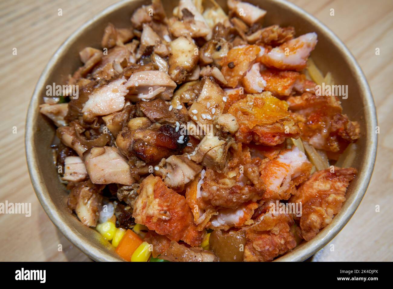 A Crispy and Delicious BBQ Chicken Chop Double Rice Stock Photo - Alamy