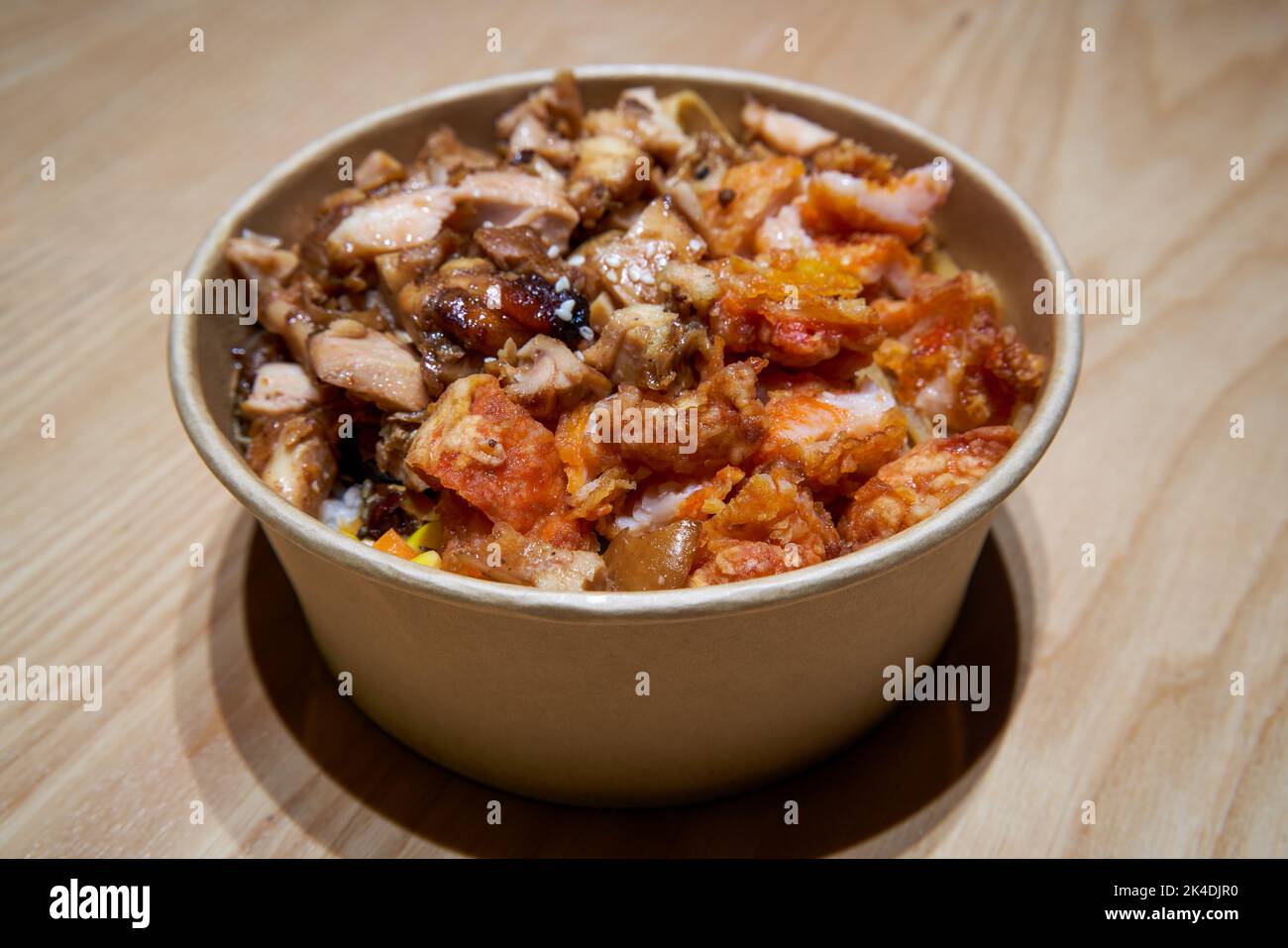 A Crispy and Delicious BBQ Chicken Chop Double Rice Stock Photo - Alamy