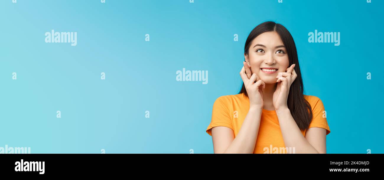 Hopeful excited cute optimistic asian girl believe dreams come true ...