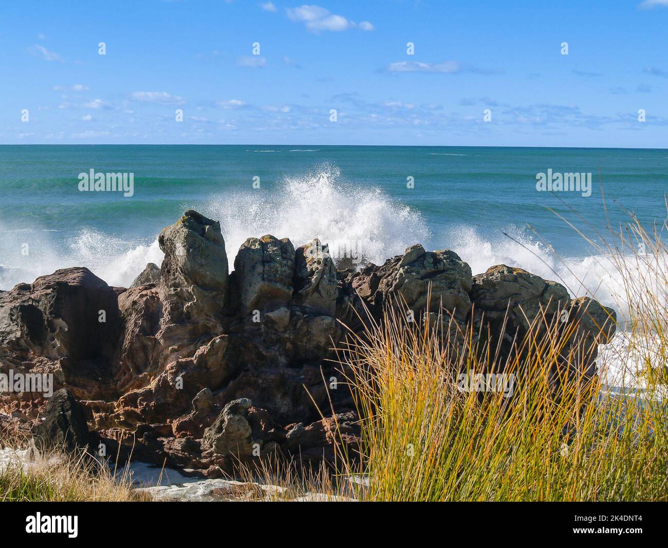 Wave breaking over around hi-res stock photography and images - Alamy