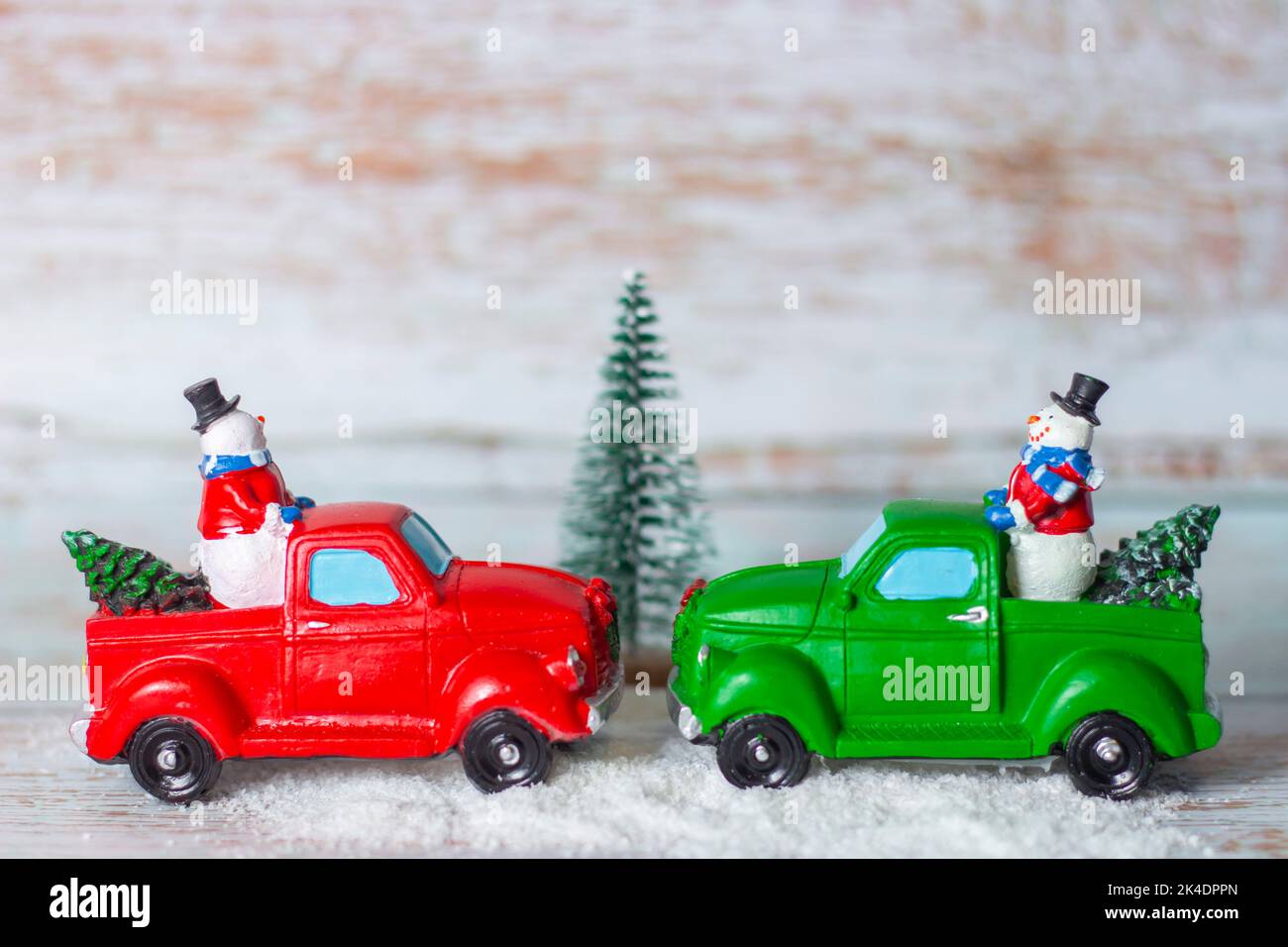 Snowman Figures with christmas cars Stock Photo - Alamy