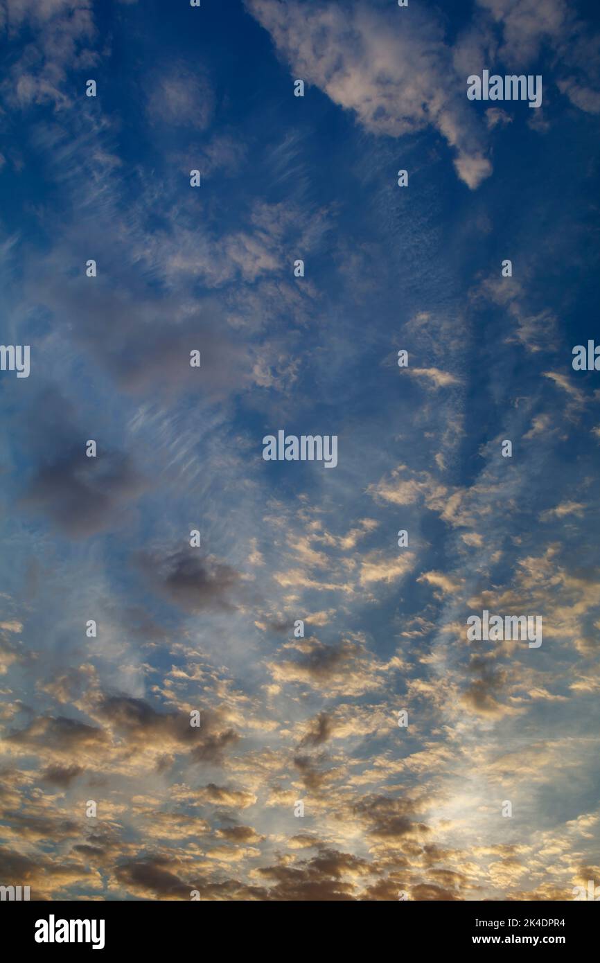 Patchy cloud with cirrus clouds Stock Photo - Alamy