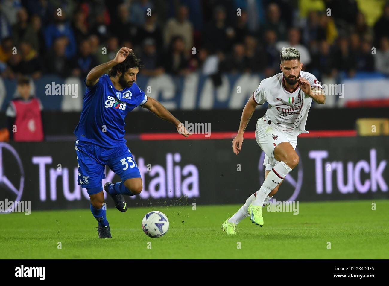 Sebastiano Luperto (Empoli)Olivier Giroud (Milan) during the "Serie A ...