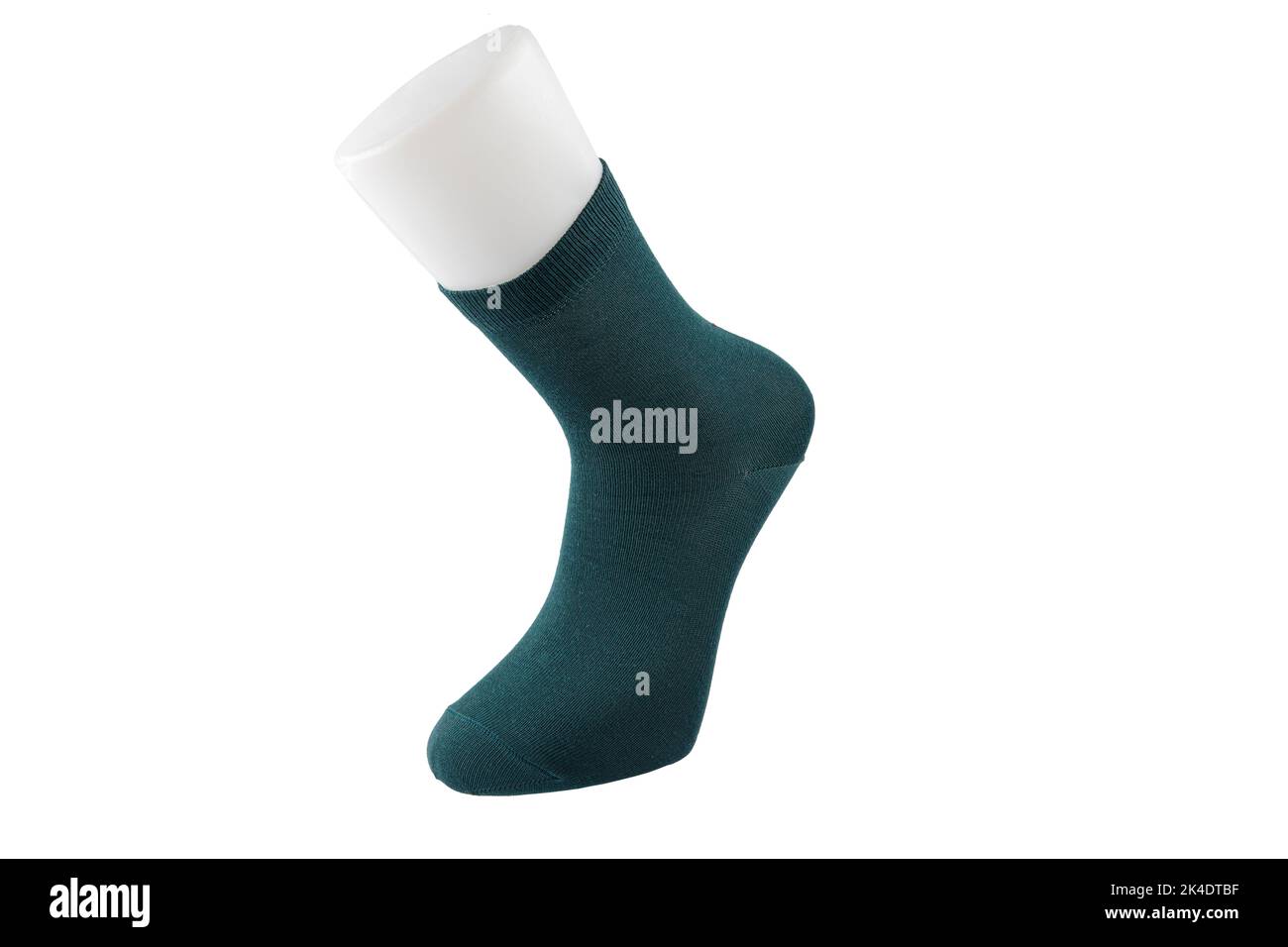 Side view of plastic foot wearing new beautiful and soft natural cotton ...