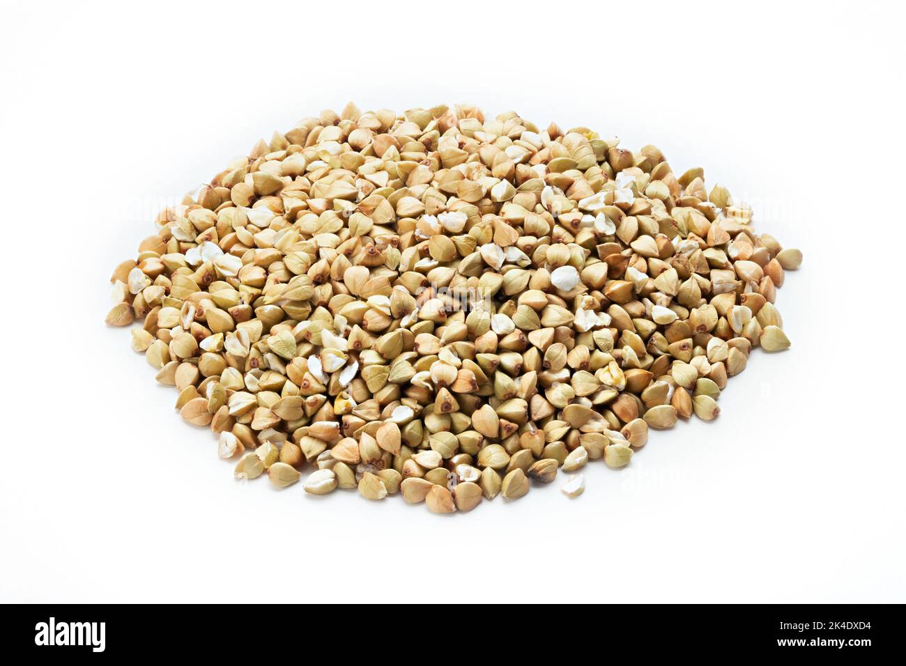 Pile of buckwheat on white background. Buckwheat. Buckwheat grains ...
