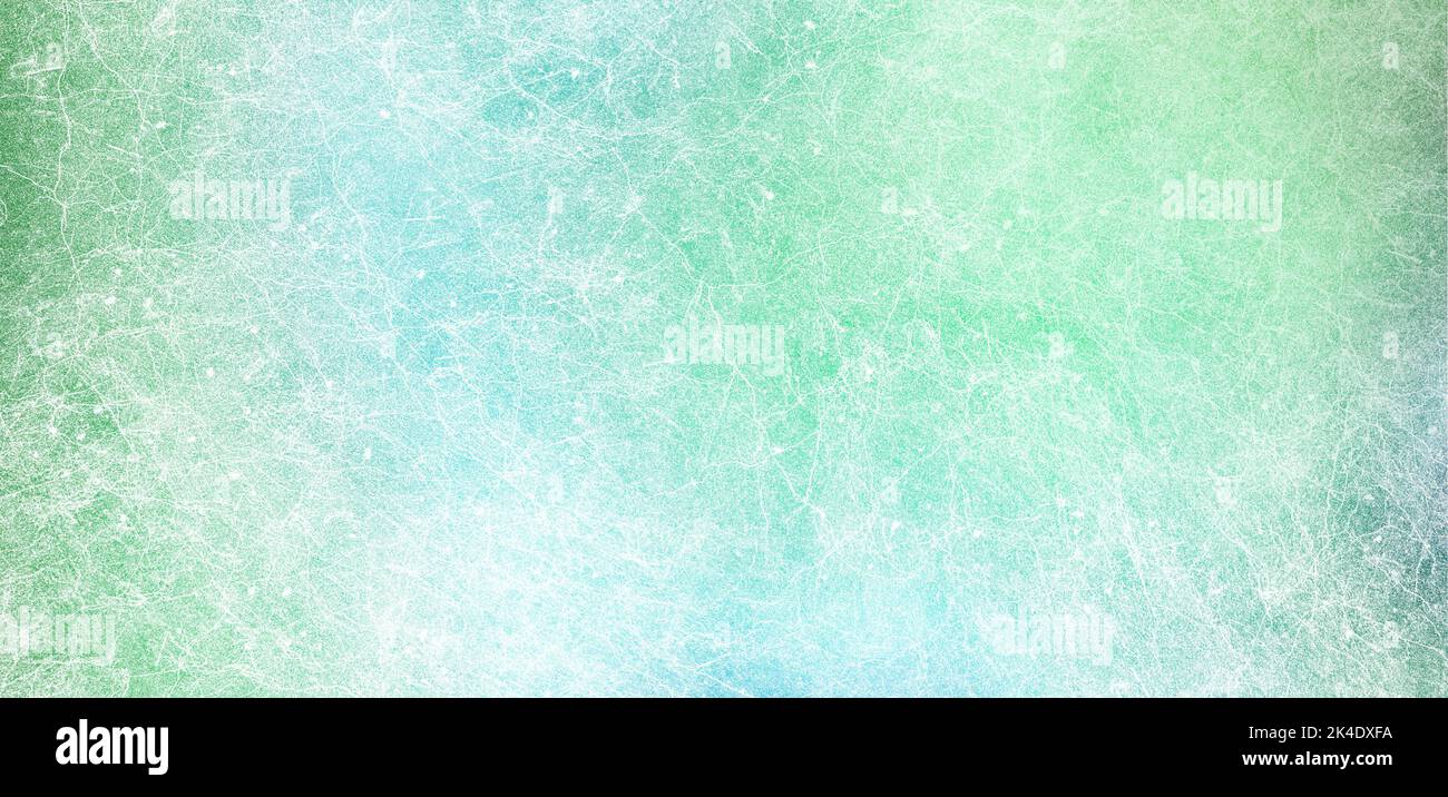 Pastel green and blue gradient background texured with icy frosty ...