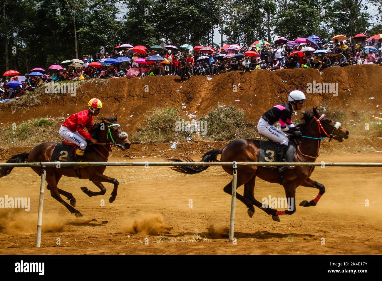 Tanjungsari, West Java, Indonesia. 2nd Oct, 2022. Jockeys competing ...