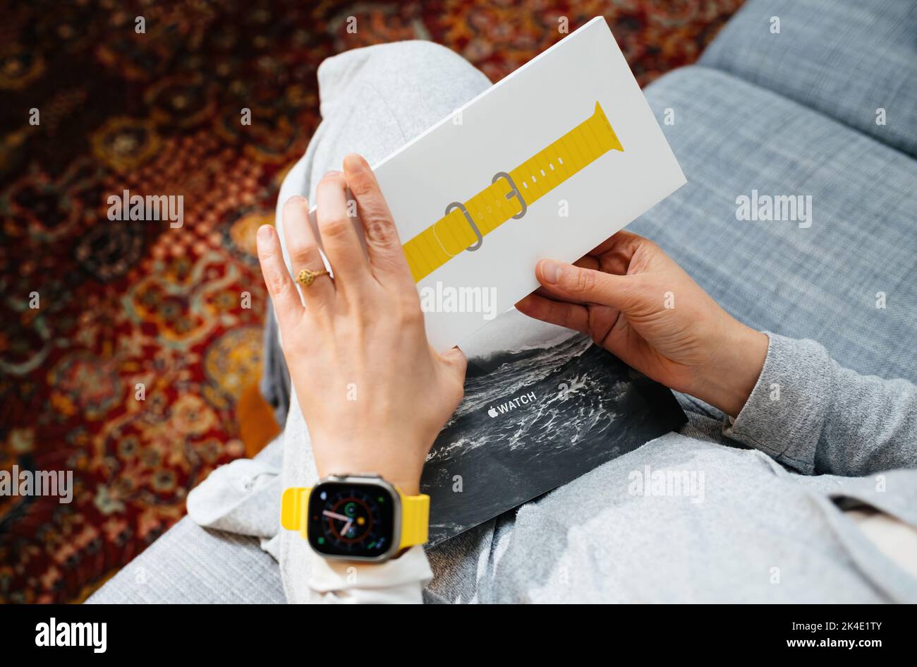 London, United Kingdom - Sept 28, 2022: Curious woman wearing Apple ...